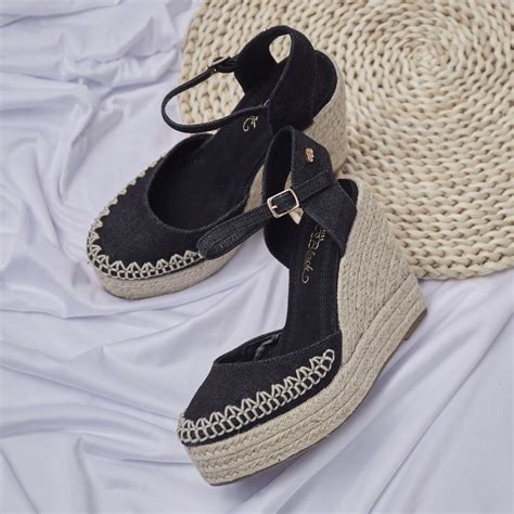 Miss Black Footwear Contact Us