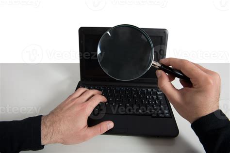 Hacker Looking For A Password In A Laptop With Magnifier Lens 25254737 Png