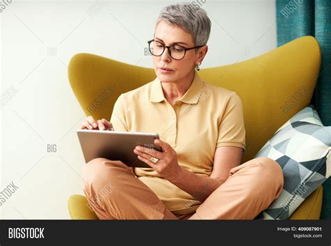 Mature Woman Sitting Image And Photo Free Trial Bigstock