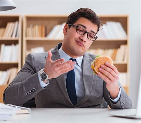 Hungry Funny Businessman Eating Junk Food Sandwich Stock Image Image