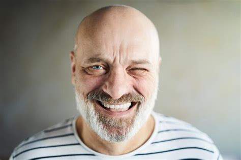 Premium Photo Portrait Of Excited Emotional Bald Mature Man With Gray