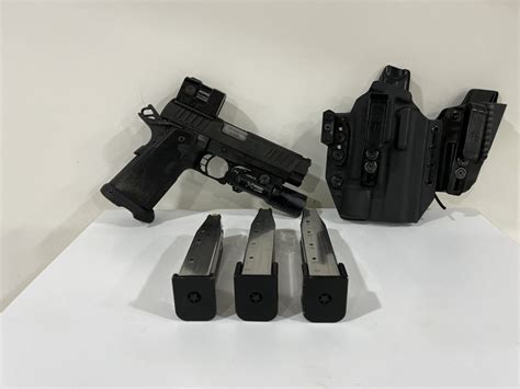 Item Relisted FS Staccato P With Aimpoint Acro Surefire T C Holster The Outdoors Trader