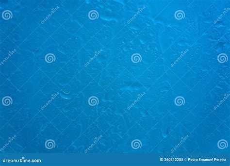 Drops Of Rainwater Running Down The Blue Glass Stock Image Image Of