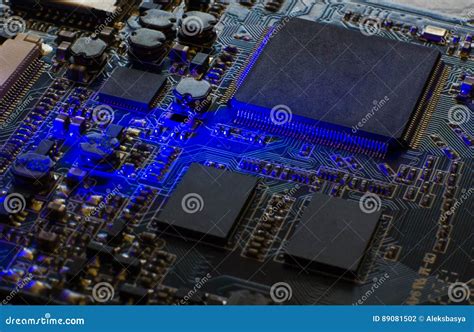 Microprocessor On Blue Circuit Board Close Up Of A Computer Microchip Stock Photo Image Of