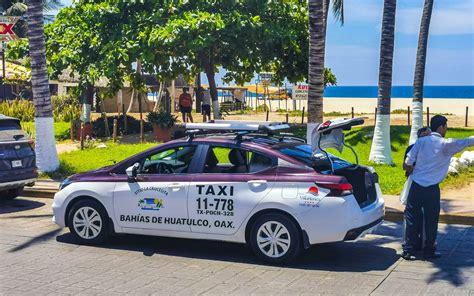 Puerto Escondido Oaxaco Mexico 2023 Colorful Taxi Cab Car And