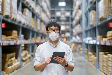 Portrait Asian Men Staff Product Counting Warehouse Control Manager
