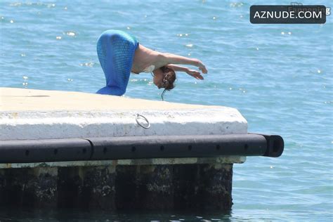 Doria Tillier Stuns In Sexy Mermaid Shoot At Cannes Beach Event Aznude