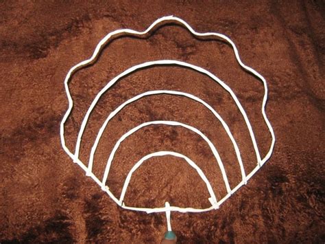 Морская раковина из газетных трубочек Элегантное интерьерное украшение своими руками МК