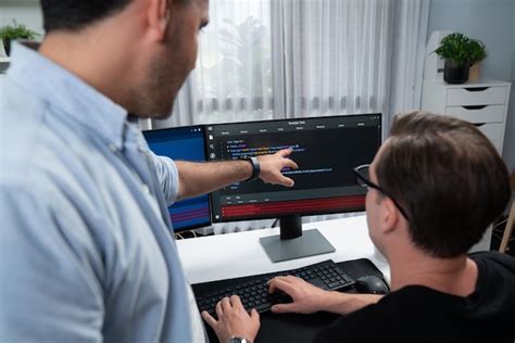 premium photo it developers pointing on software development