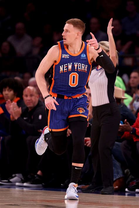 Download New York Knicks Player Signaling During Game Wallpaper
