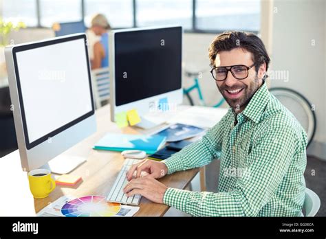 Graphic Designer Working On Computer Stock Photo Alamy