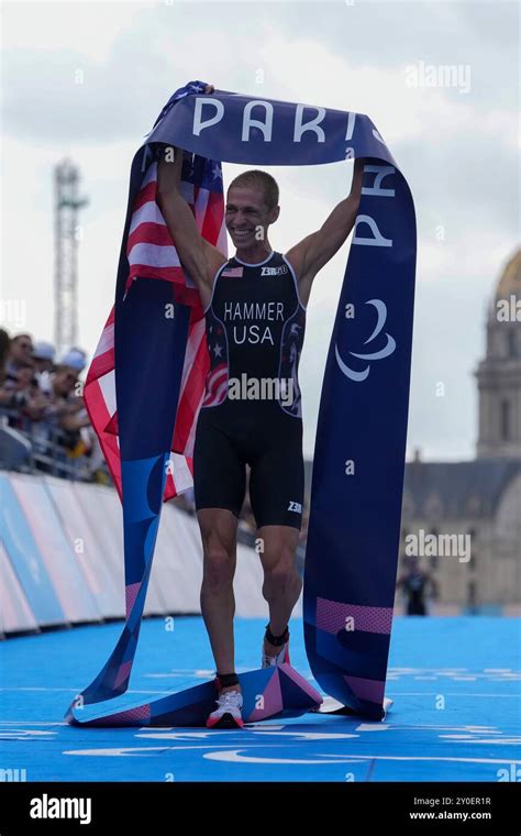 Chris Hammer From The Us Celebrates After Winning The Mens Pts5 Triathlon At The 2024