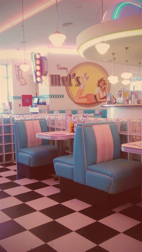 Download Vintage 50s Diner With Two Classic Cars Parked