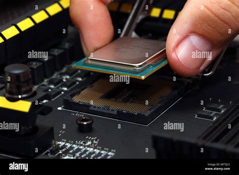 Installing Modern Central Processor Unit Into Motherboard Stock Photo Alamy
