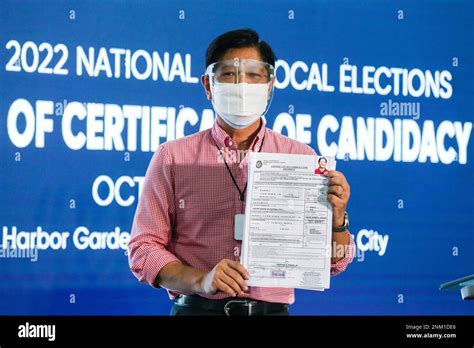 Former Senator Ferdinand Bongbong Marcos Jr Poses After Filing His