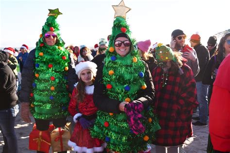 Surfing Santas Draws Hundreds On Christmas Eve In Cocoa Beach