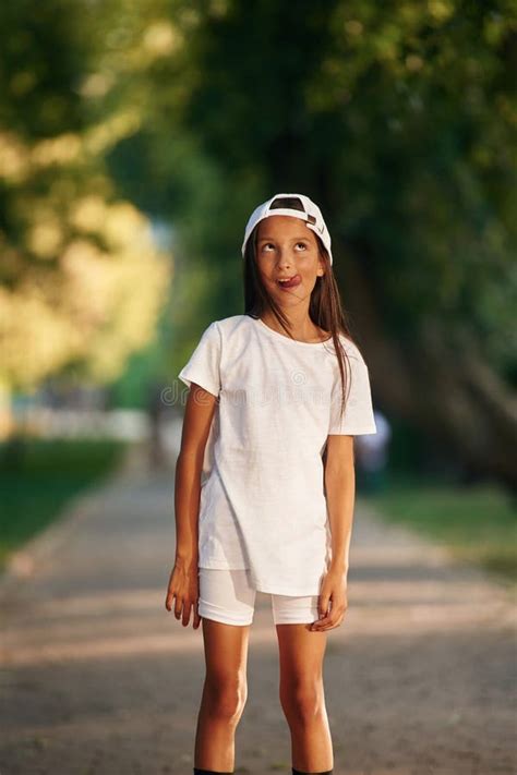 Playful Facial Expression Young Girl In Casual Clothes Is In The