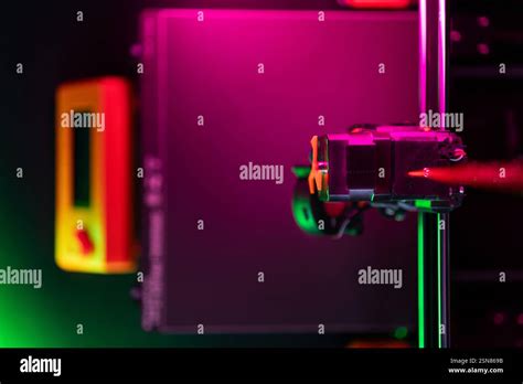 3d Printer Hot Table Surface From Above Dark Neon Light Orange Details