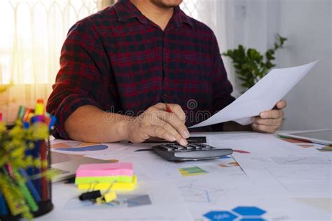 Businessmen Are Analyzing Graphs At The Desk Stock Image Image Of Analyzing Capital 231054613