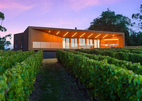 Red Hill Residence By Finnis Architects Has A Deck Overlooking A Winery