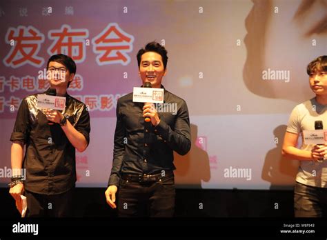 South Korean Actor Song Seung Heon Center Smiles During A Press