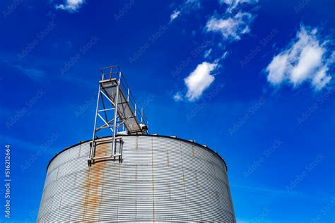 Vertical View Of A Steel Constructed Grain Silo Showing The Metal
