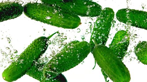 Super Slow Motion Fresh Cucumbers Underwater With Air Bubbles Filmed