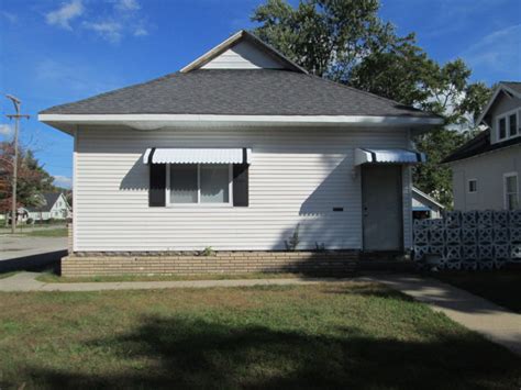 Home Metal Window Awnings 07 Muskegon Awning And Fabrication