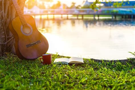 Premium Photo Woman Reading Book In Grass