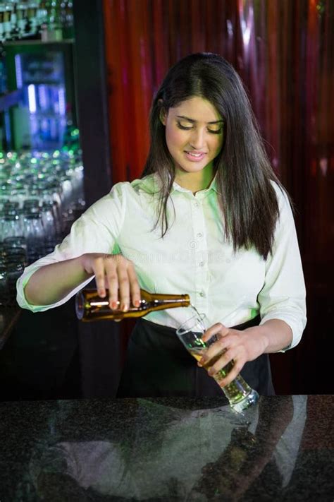 Pretty Bartender Preparing A Drink At Bar Counter Stock Image Image Of Bottle Attractive