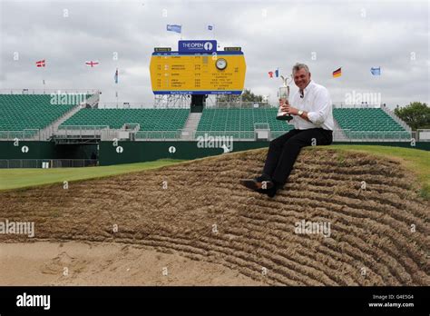 Northern Irelands Darren Clarke Celebrates With The Claret Jug On The