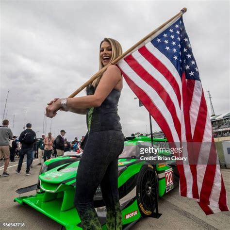 Race Flag Girl Photos And Premium High Res Pictures Getty Images