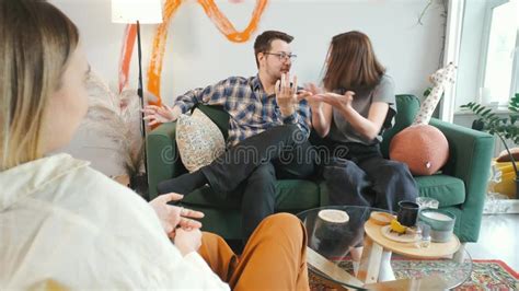 Unhappy Couple Having Emotional Argument And Blaming Each Other On