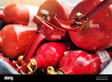 Many Red Fire Extinguishers Are Lying In Stack Fire Extinguishing