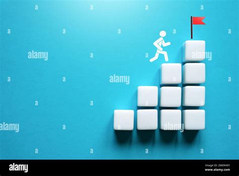 Man Climbs The Stairs To Success Movement Towards The Goal Step By