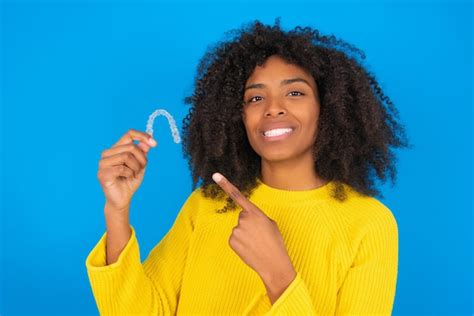 Premium Photo Young African American Woman Wearing Yellow Sweater