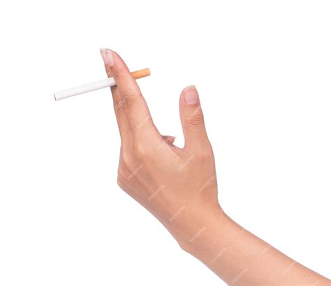 흰색 배경에 격리된 담배꽁초를 들고 있는 손 프리미엄 사진