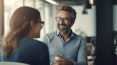 Premium Photo Smiling Aged Businesswoman In Glasses Looking At