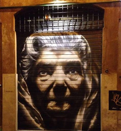 In Rome Shop Shutters Serve As After Dark Art Canvases Italy Magazine