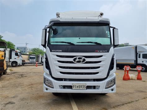 엑시언트 17톤후축윙바디14년식오토무시동에어컨and히터1020m전문가들