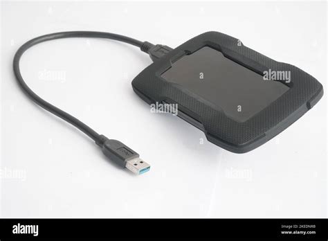Portable External Hard Drive With Connected Usb Cable In White Background Stock Photo Alamy