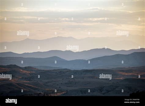 The Rolling Hills And Towering Mountain Ranges Are Ablaze With The Warm