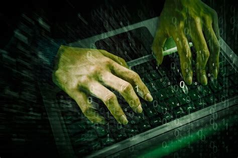 premium photo double exposure of hacker hands using a laptop