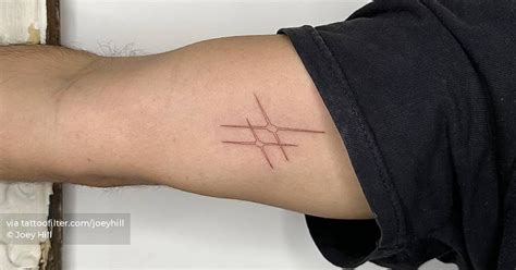 Fine Line Style Tattoo Located On The Inner Arm