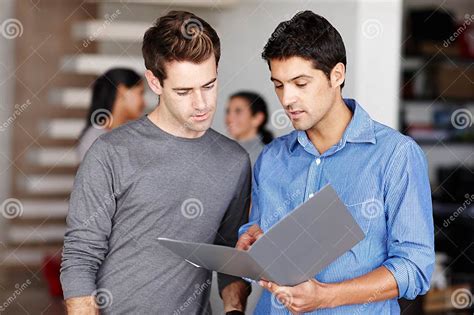 Employees Men And Discussion With Folder At Office For Teamwork Or