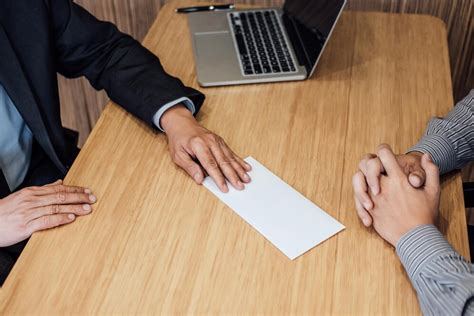 Premium Photo High Angle View Of Businessman Taking Interview At Desk In Office