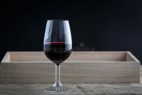 A Glass Of Red Wine On Black Background Stock Image Image Of Glass
