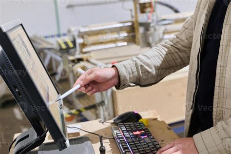 Operator Entering Coordinates On Computer For Cnc Machine To Precisely