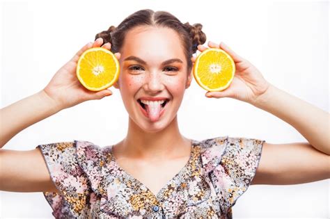 Premium Photo Beauty Model Girl With Juicy Oranges Beautiful Joyful