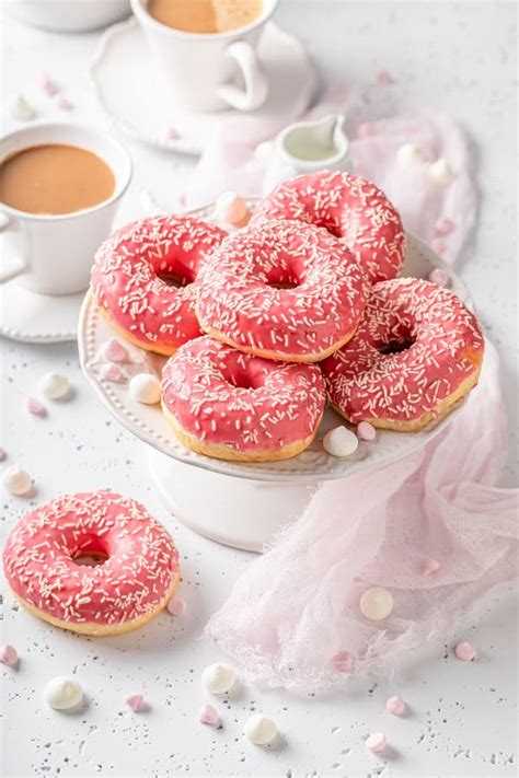 Colorful And Tasty Pink Donuts And Coffee As Best Dessert Stock Image